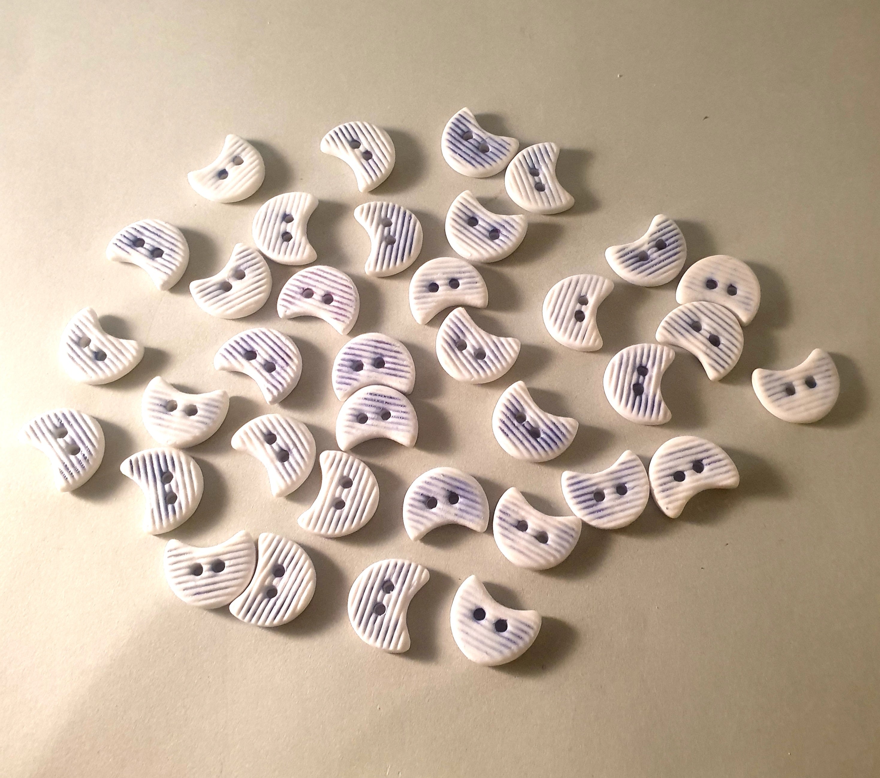 Porcelain half moon buttons. – Lynette Rogers Ceramics